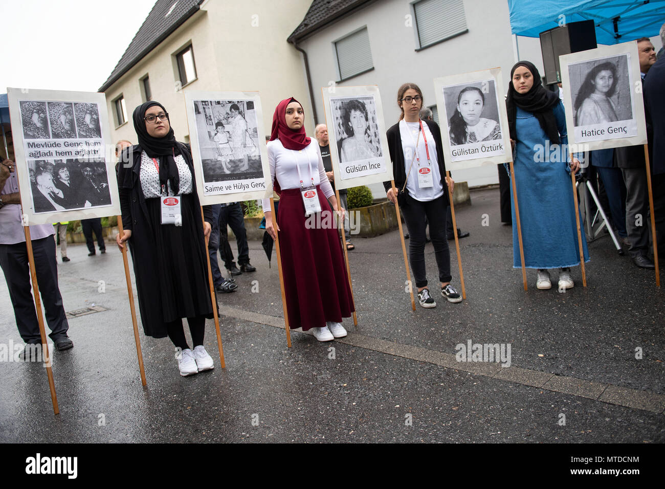 Solingen, Germany. 29 May 2018. Young women carry pictures of the ...