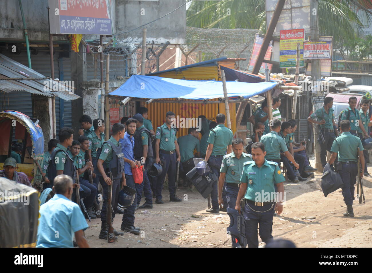 Dhaka. 29th May, 2018. Law enforcers raid an area as part of a ...