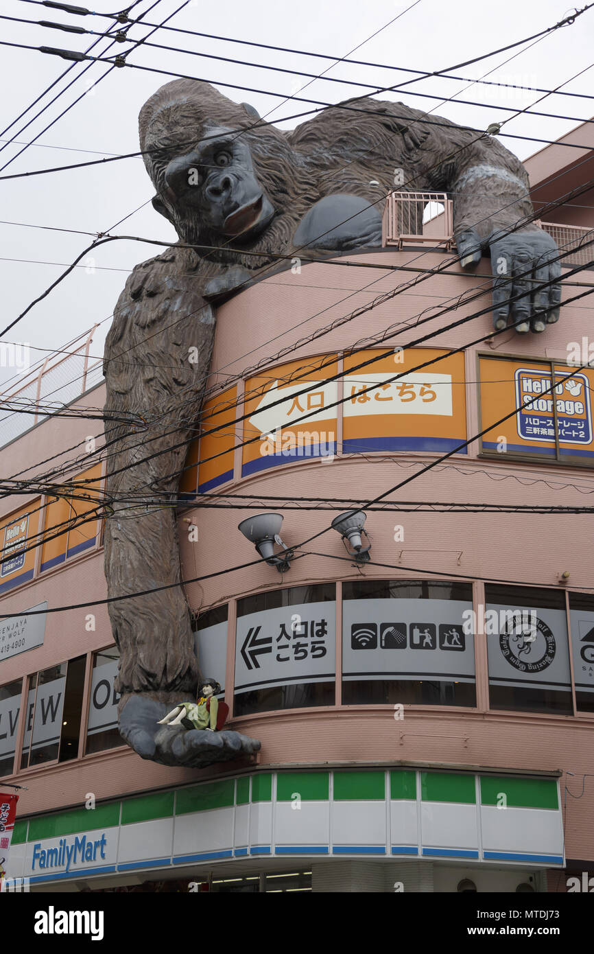 Tokyo, Japan. 30th May, 2018. A giant gorilla holding a school girl in ...