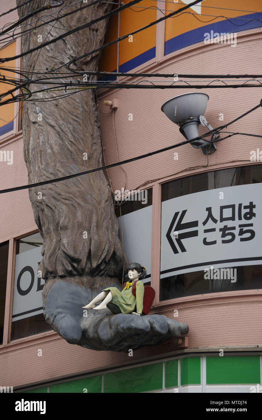 Tokyo, Japan. 30th May, 2018. A giant gorilla holding a school girl in ...