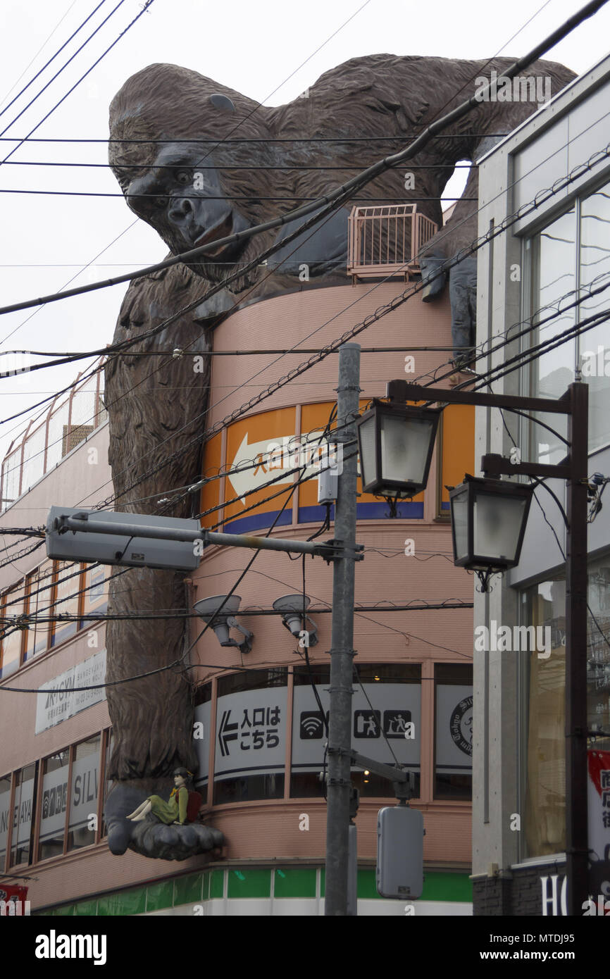 Tokyo, Japan. 30th May, 2018. A giant gorilla holding a school girl in ...
