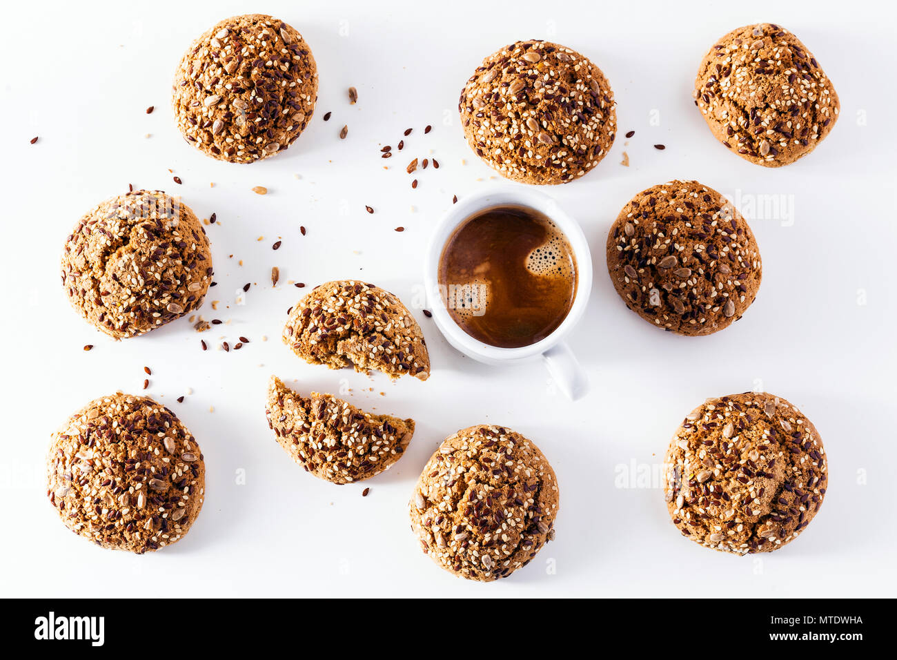 a cup of espresso and fresh biscuits on a white background. a frame for ...