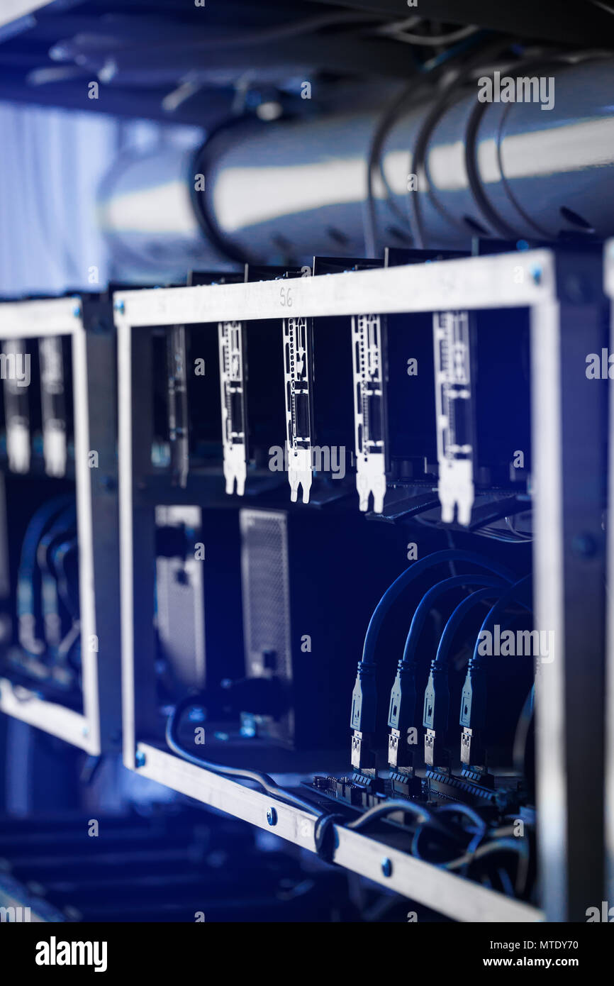 Crypto currency mining. Close-up and selective focus a graphic card of ...