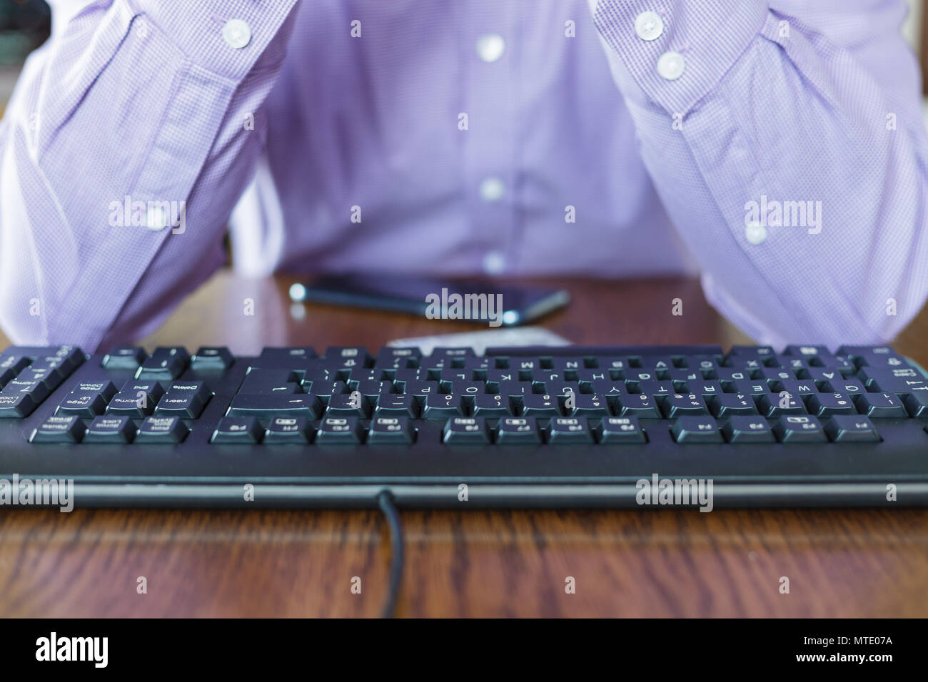 Person sitting in front of computer hi-res stock photography and images ...