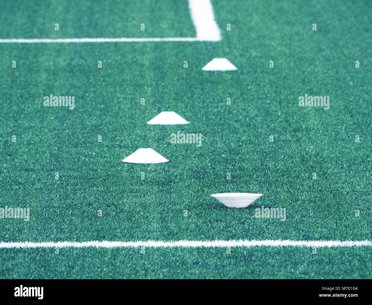 Training mark in soccer playfield. White marks on artificial green turf ...