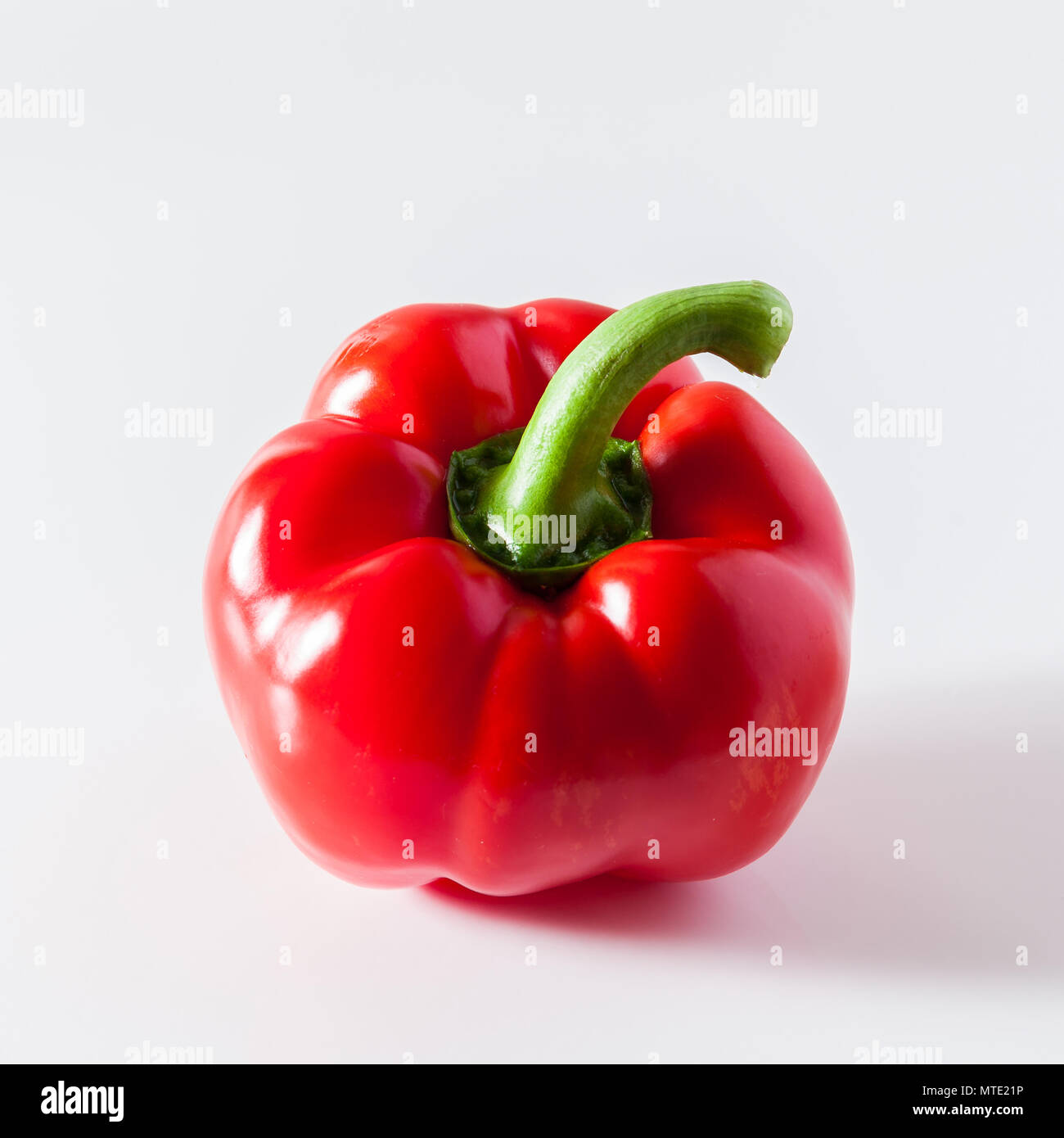 group of red ripe organic bell pepper isolated on white. copy space ...