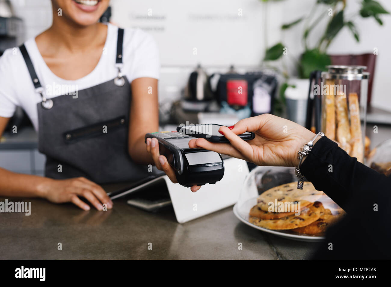 Unrecognizable female using smartphone close hi-res stock photography ...