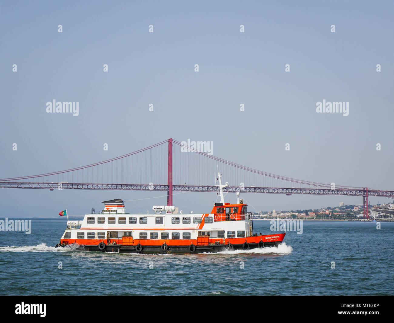A ferry-boat sails on the Tagus river from Almada harbour to Cais do ...