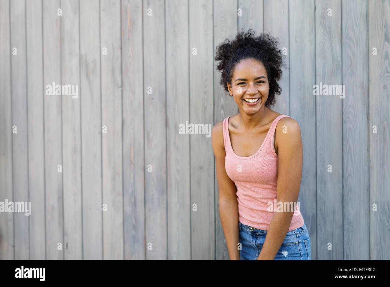 Mixed race woman looking camera hi-res stock photography and images - Alamy
