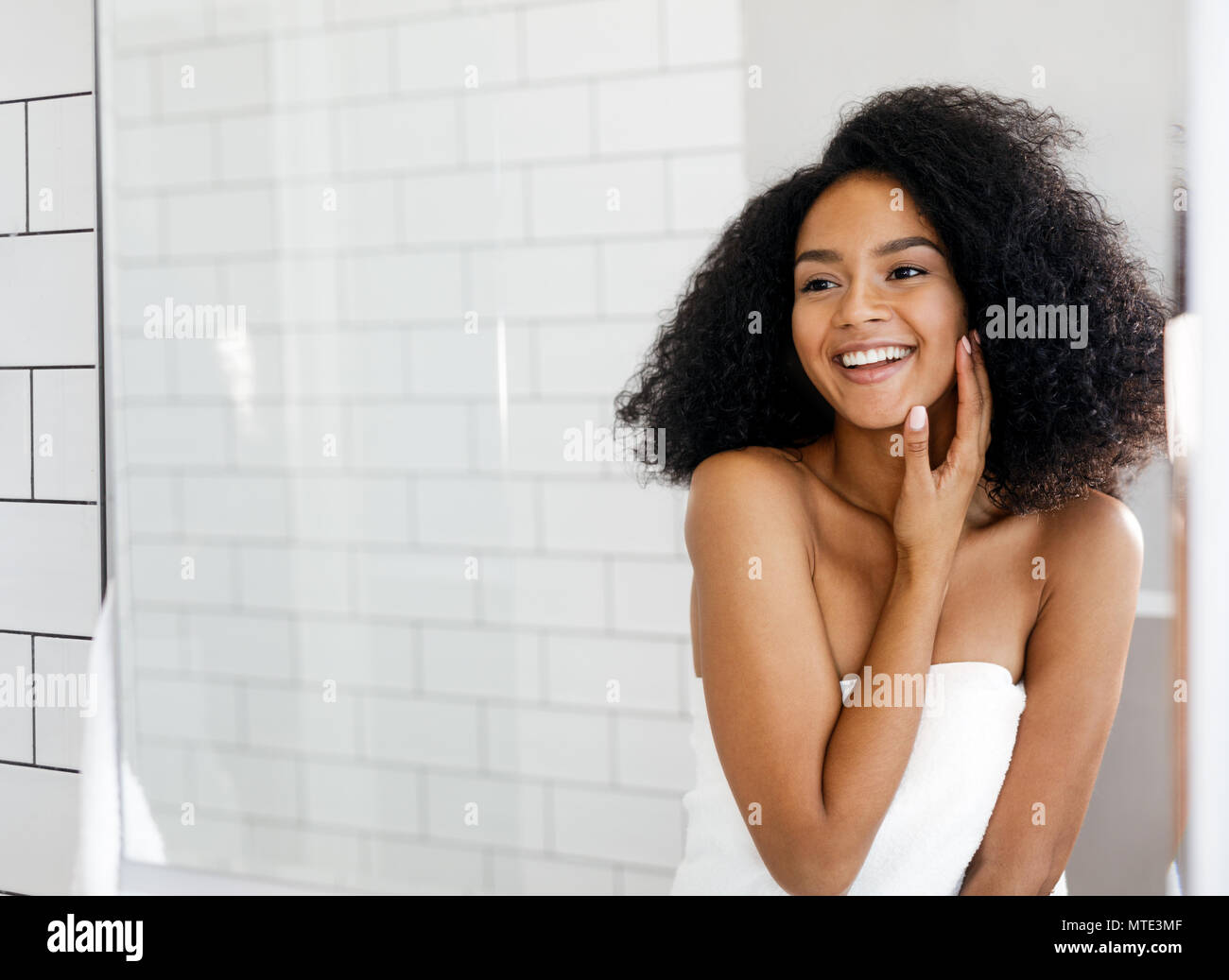 Hand touching mirror hi-res stock photography and images - Alamy