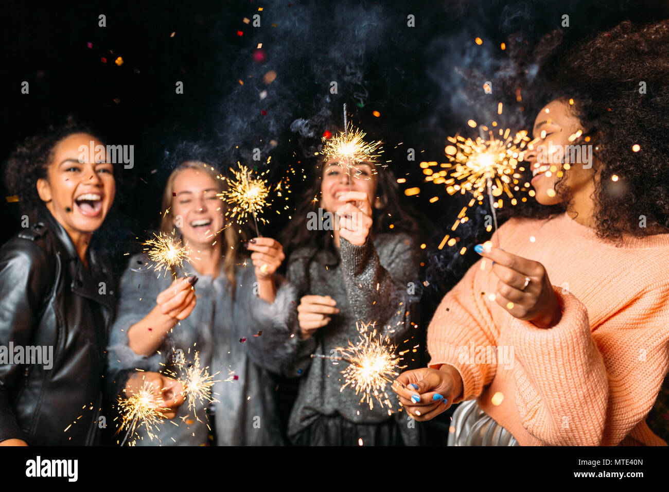 Women friendship confetti hi-res stock photography and images - Alamy