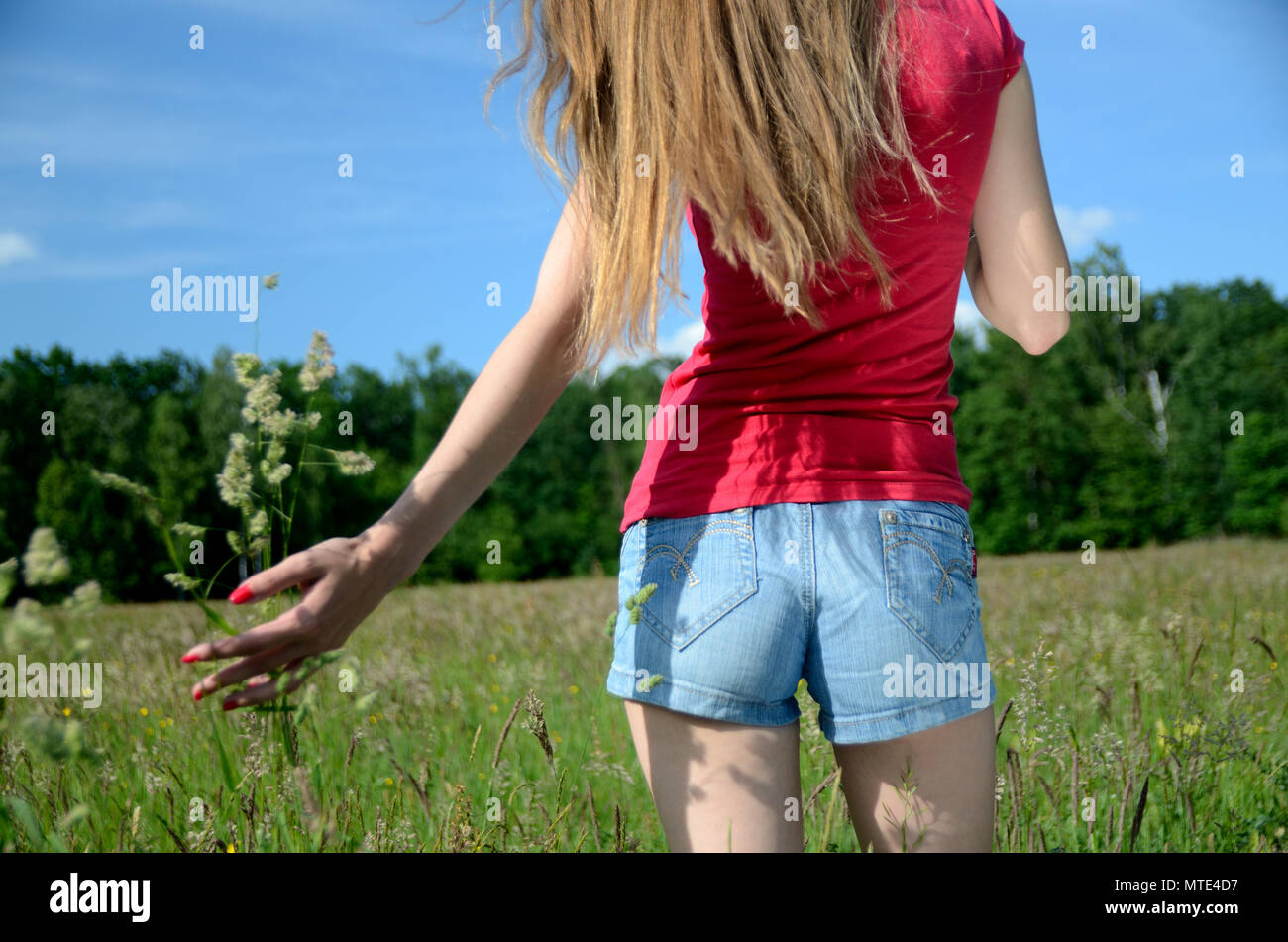 Hand down pants woman hi-res stock photography and images - Alamy