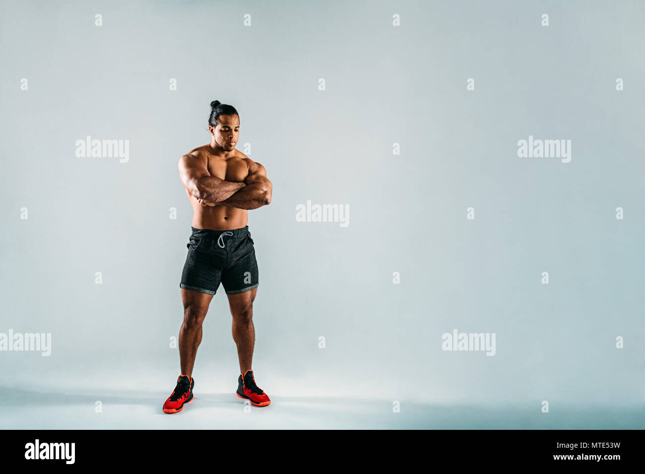 Bodybuilder crossed arms hi-res stock photography and images - Alamy