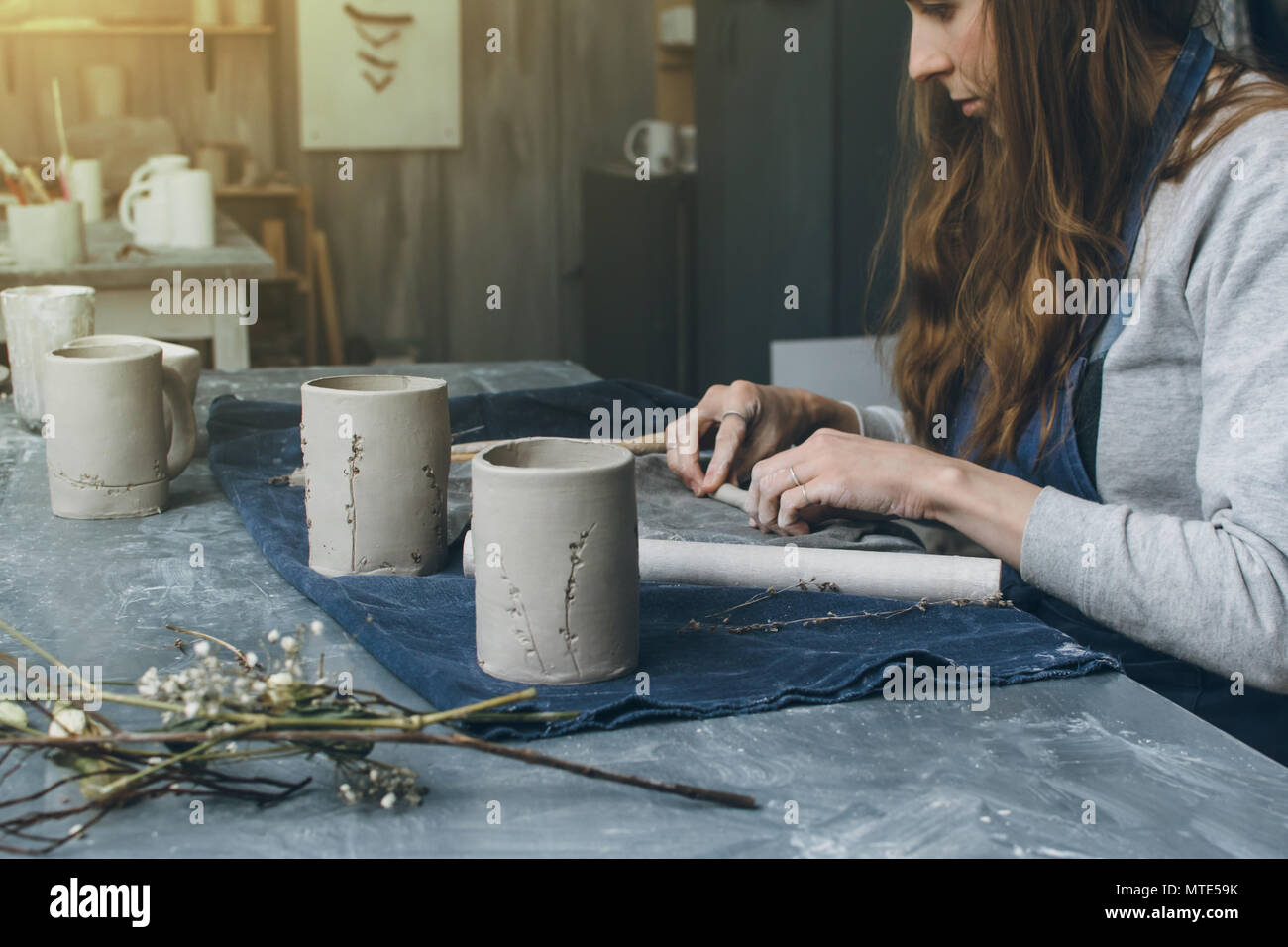 Working in ceramic workshop hi-res stock photography and images - Alamy