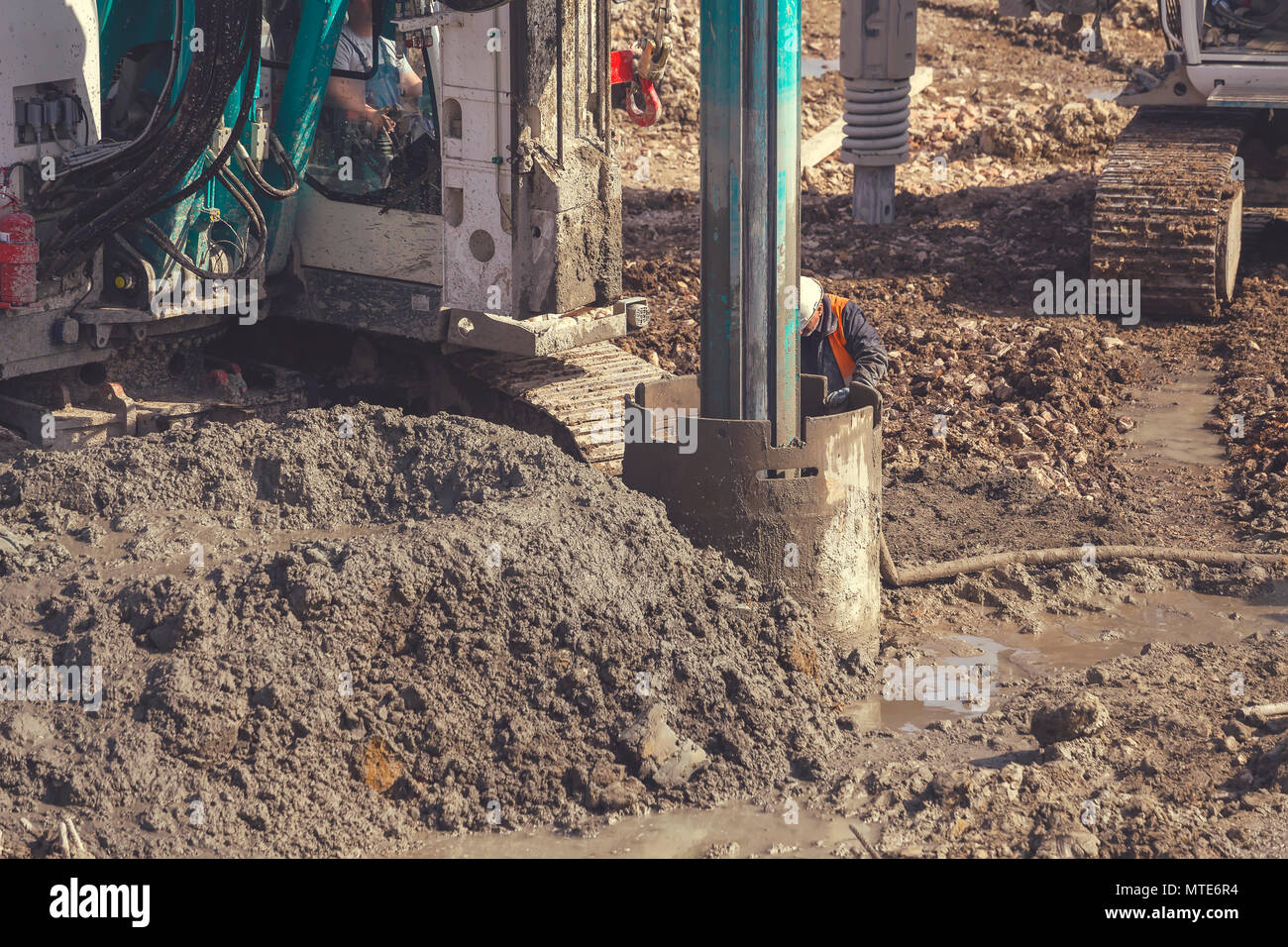 Drilling rig making deep foundation at construction site, rotary ...