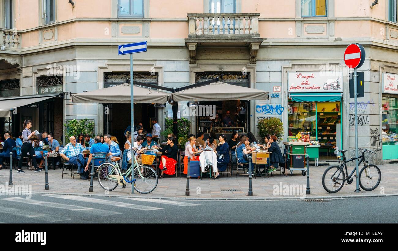 Street corner cafe terrace in the Porta Venezia district of Milan ...