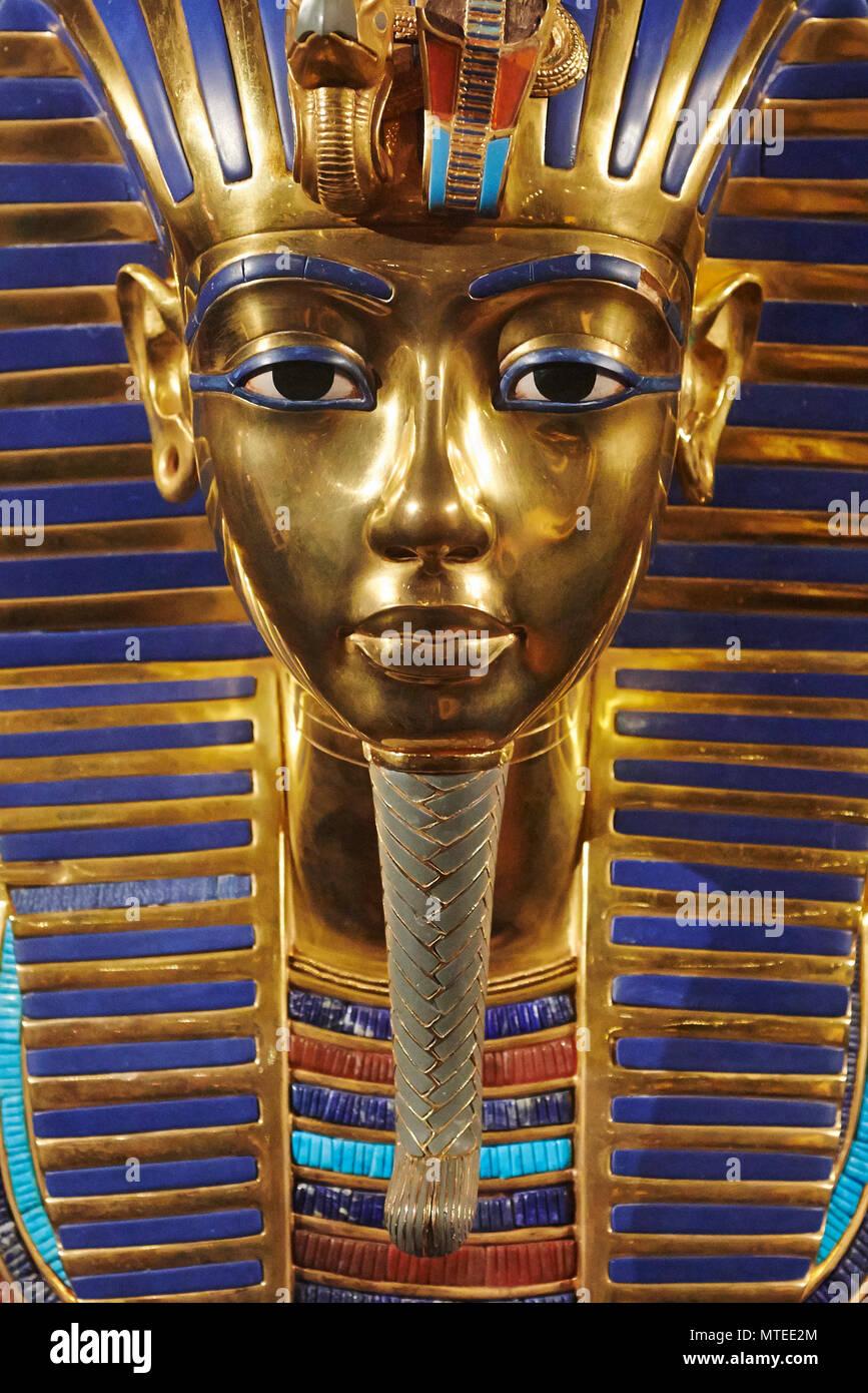 Close up of Replica of funerary mask of Tutankhamun. Isolated on black ...