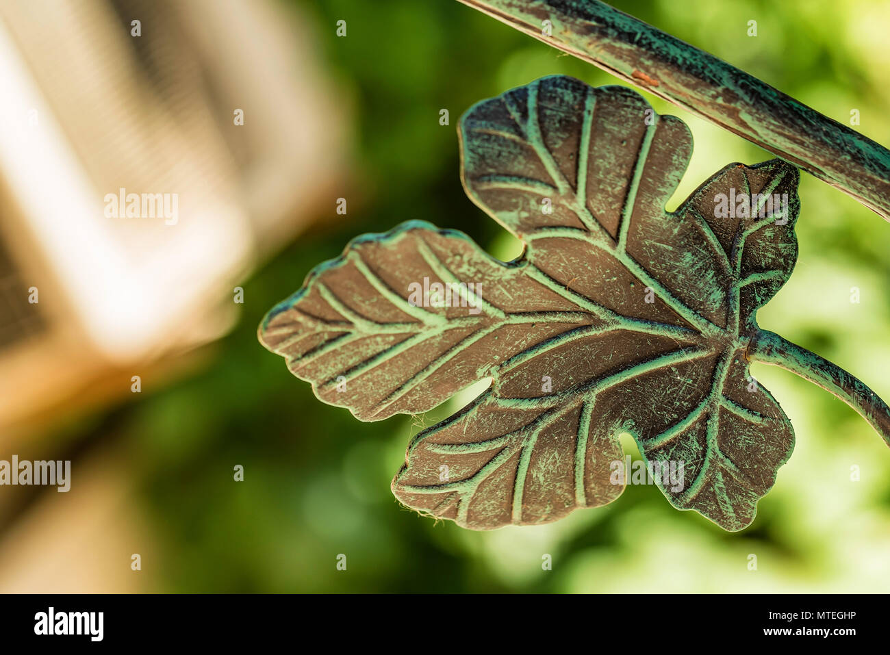 Forged metal grape leaf interior decoration Stock Photo - Alamy