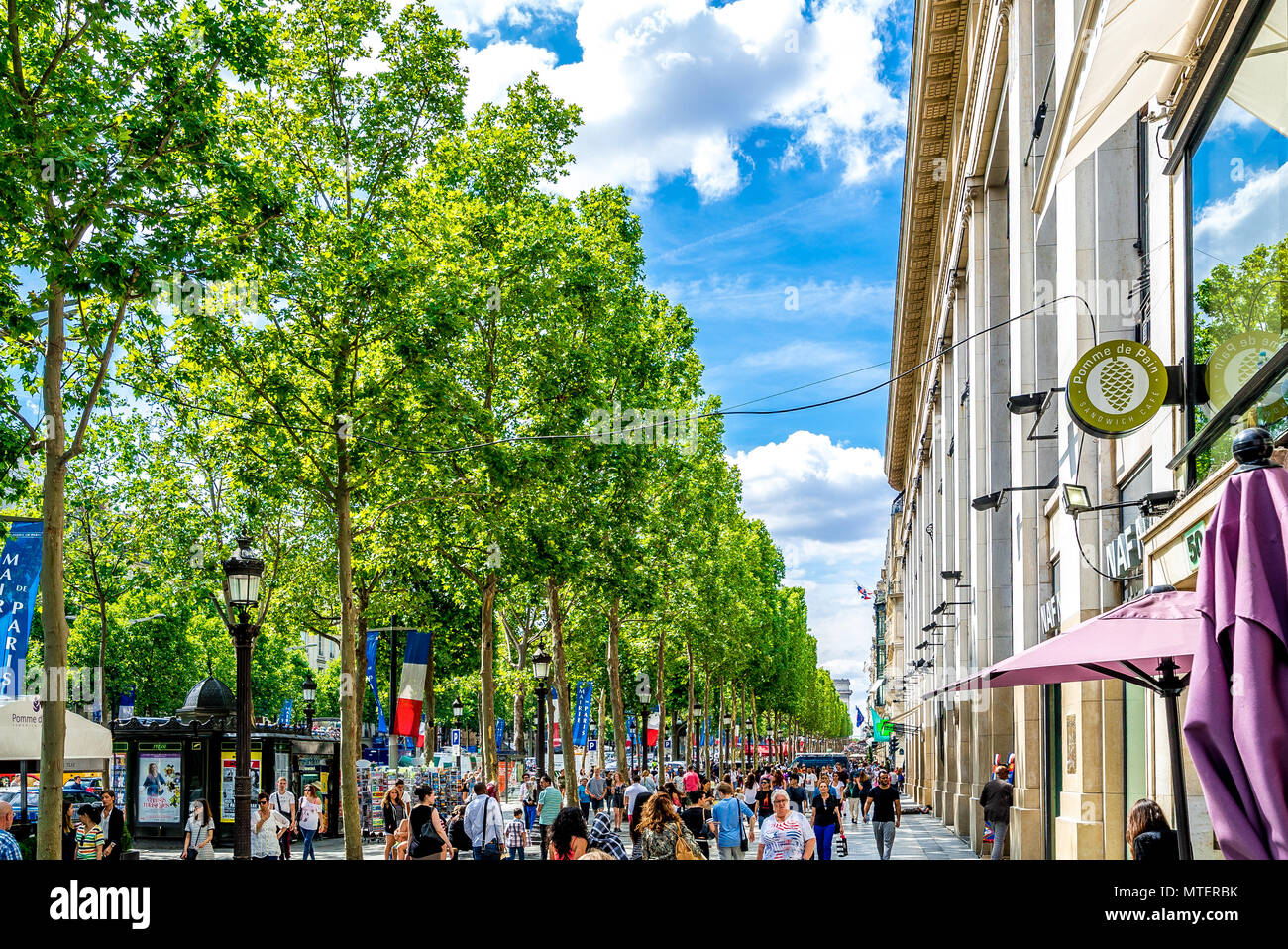 Paris champs elysees sunny hi-res stock photography and images - Alamy