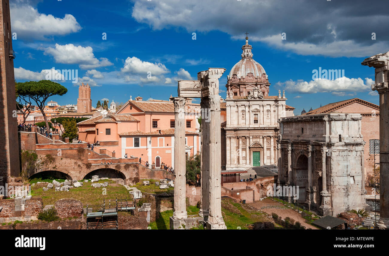 Roman Forum ruins of temples, columns, arch and baroque church in the ...
