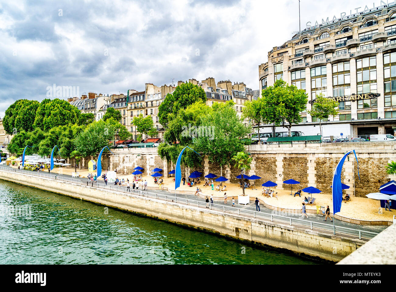The Paris Plages are temporary artificial beaches each summer along the ...