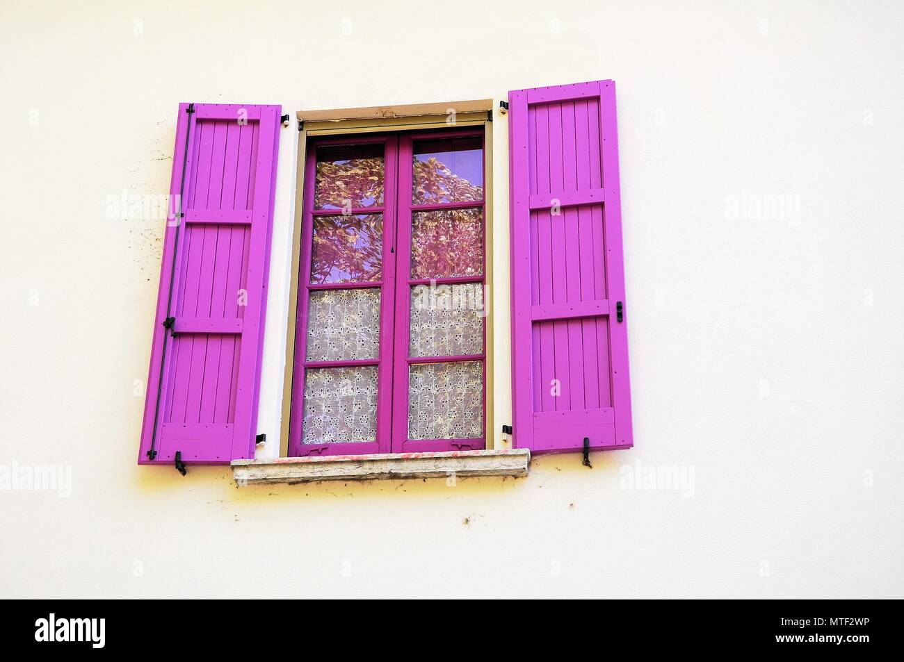 Building facade with pink window. Architectural background Stock Photo ...