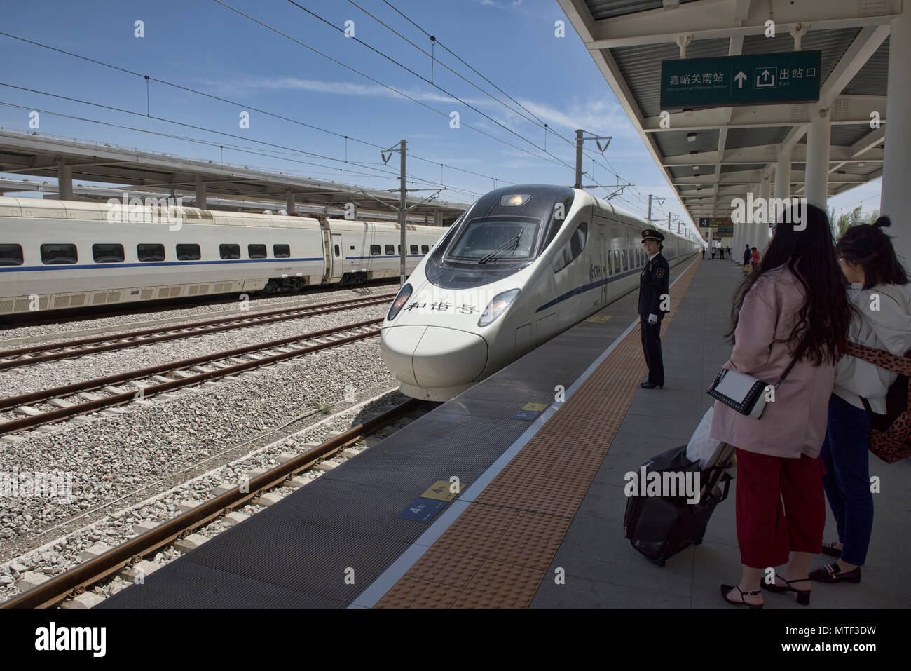 High speed bullet train arriving, China Stock Photo - Alamy