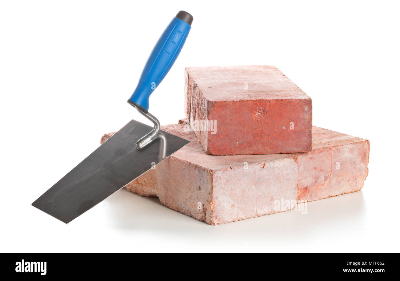 Trowel with bricks on white background - home construction or ...