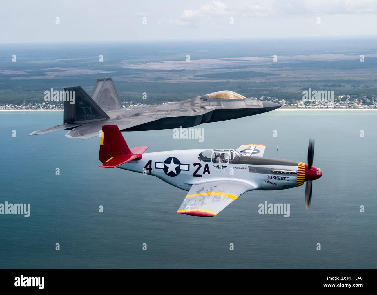 An F-22 Raptor assigned to the 43rd Fighter Squadron flies in formation ...
