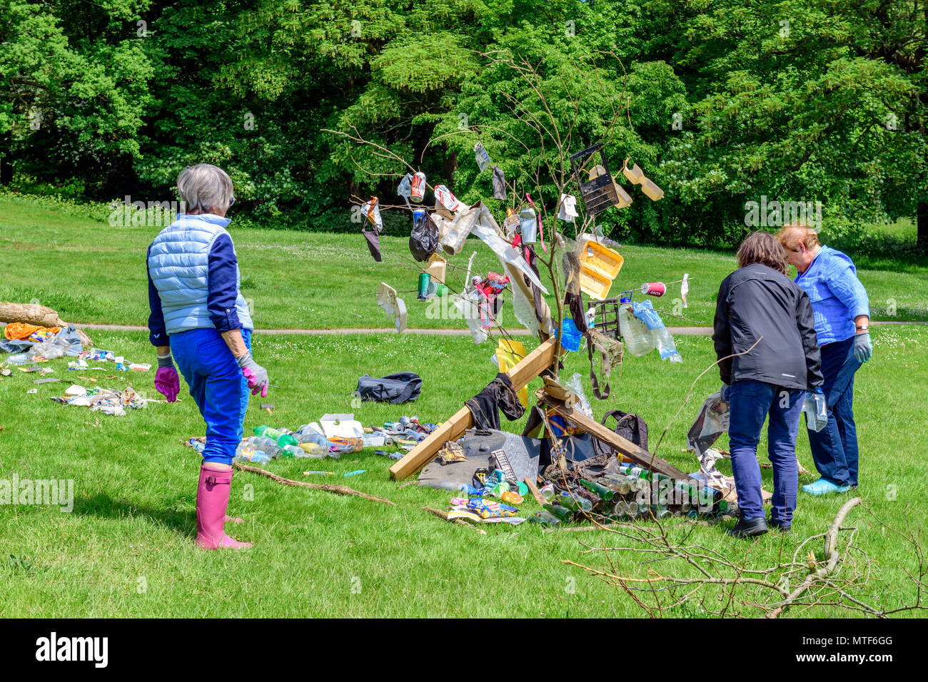 Women collecting displaying waste rubbish trash hi-res stock ...