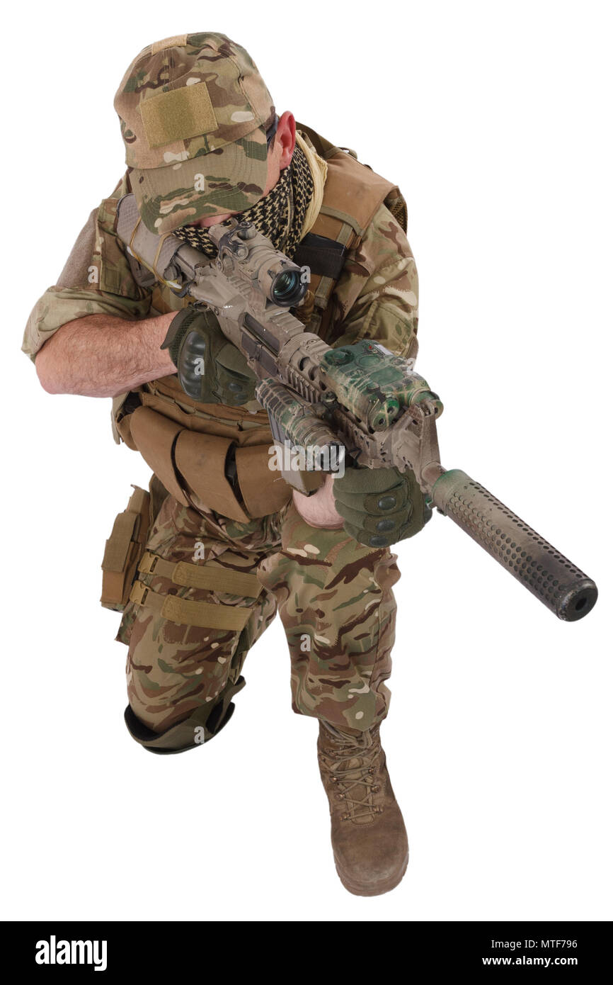 Private Military Company operator with assault rifle on white ...