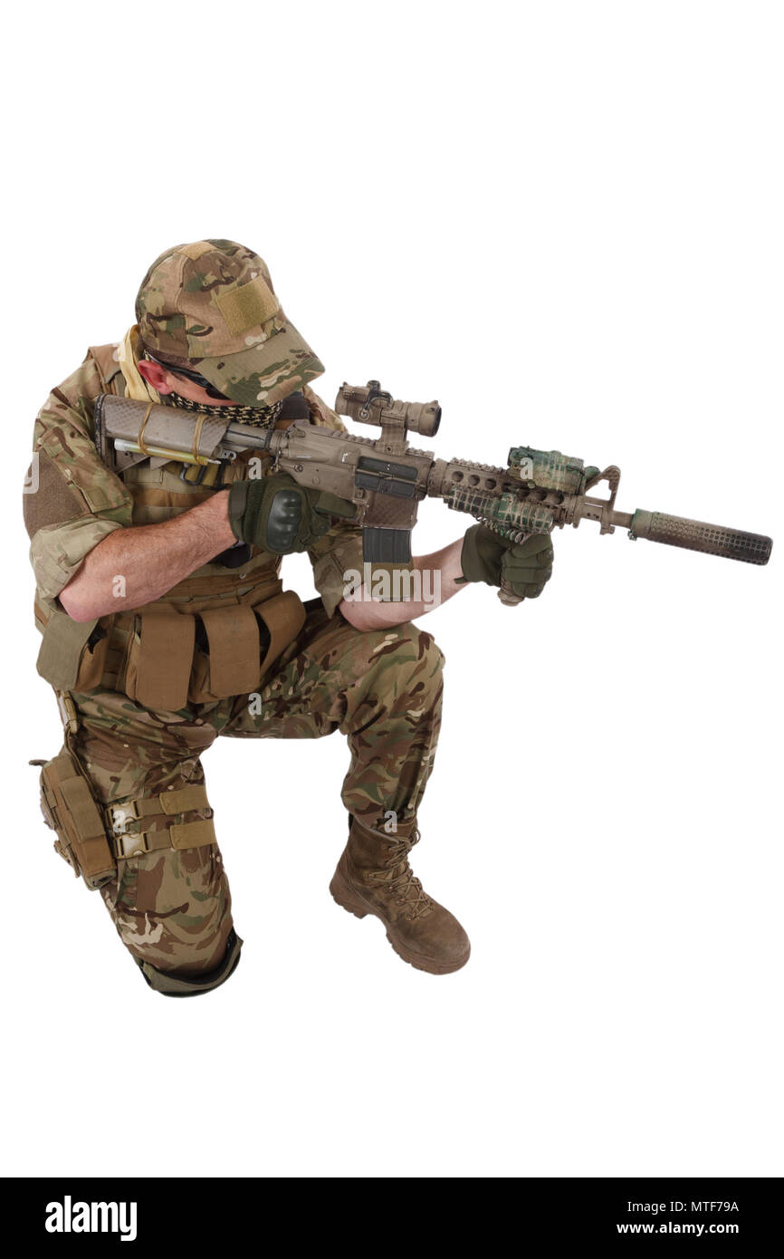 Private Military Company operator with assault rifle on white ...