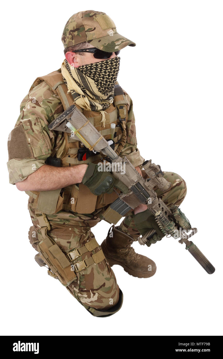 Private Military Company operator with assault rifle on white ...