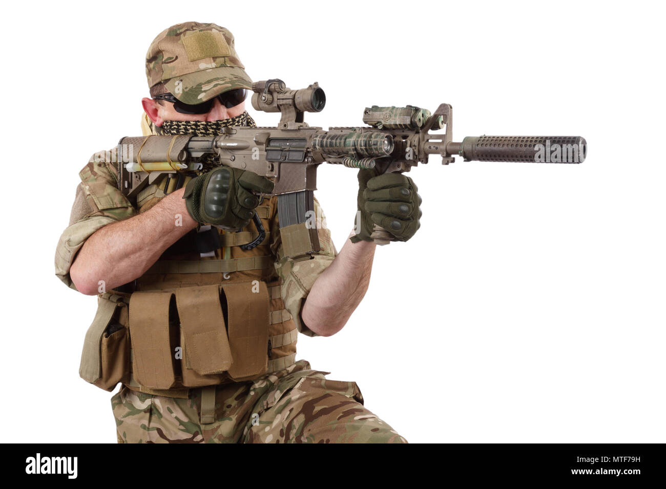 Private Military Company operator with assault rifle on white ...