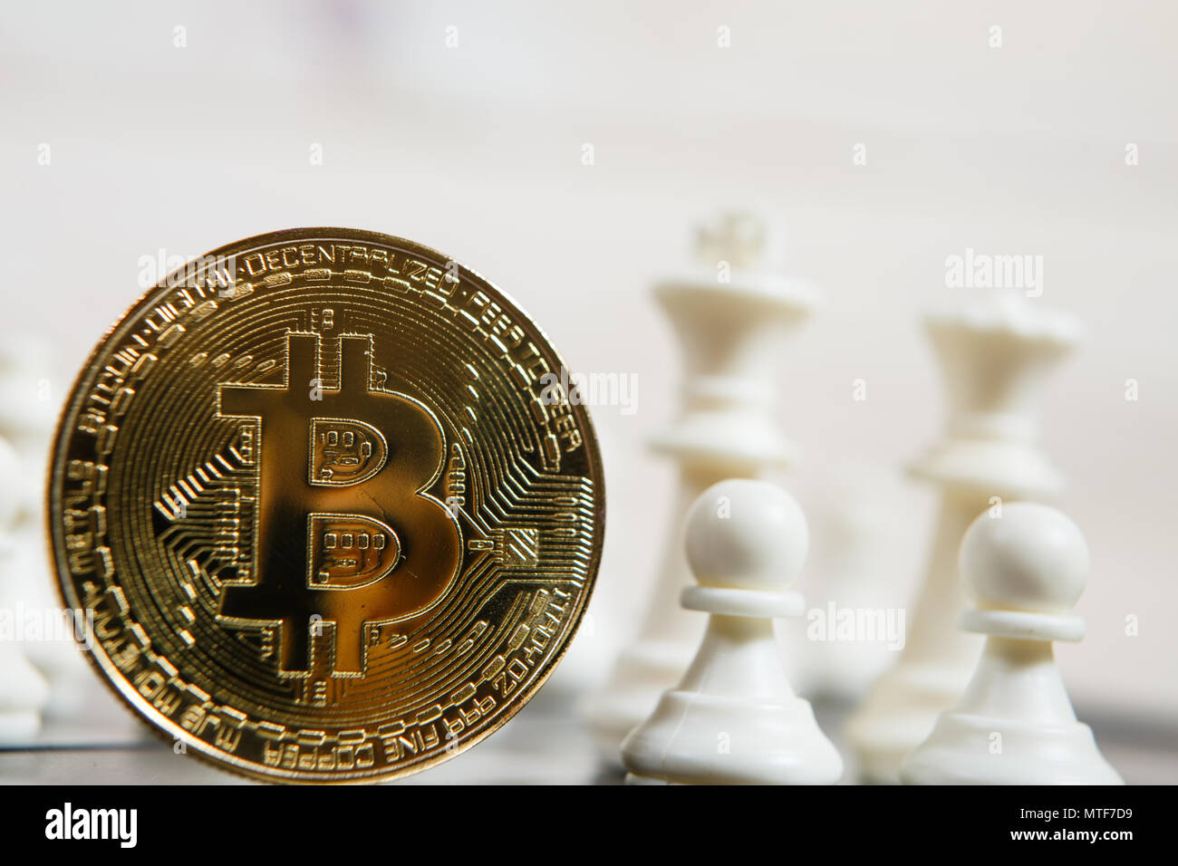 Golden bitcoin coin symbolizes elements of virtual economy or crypto ...