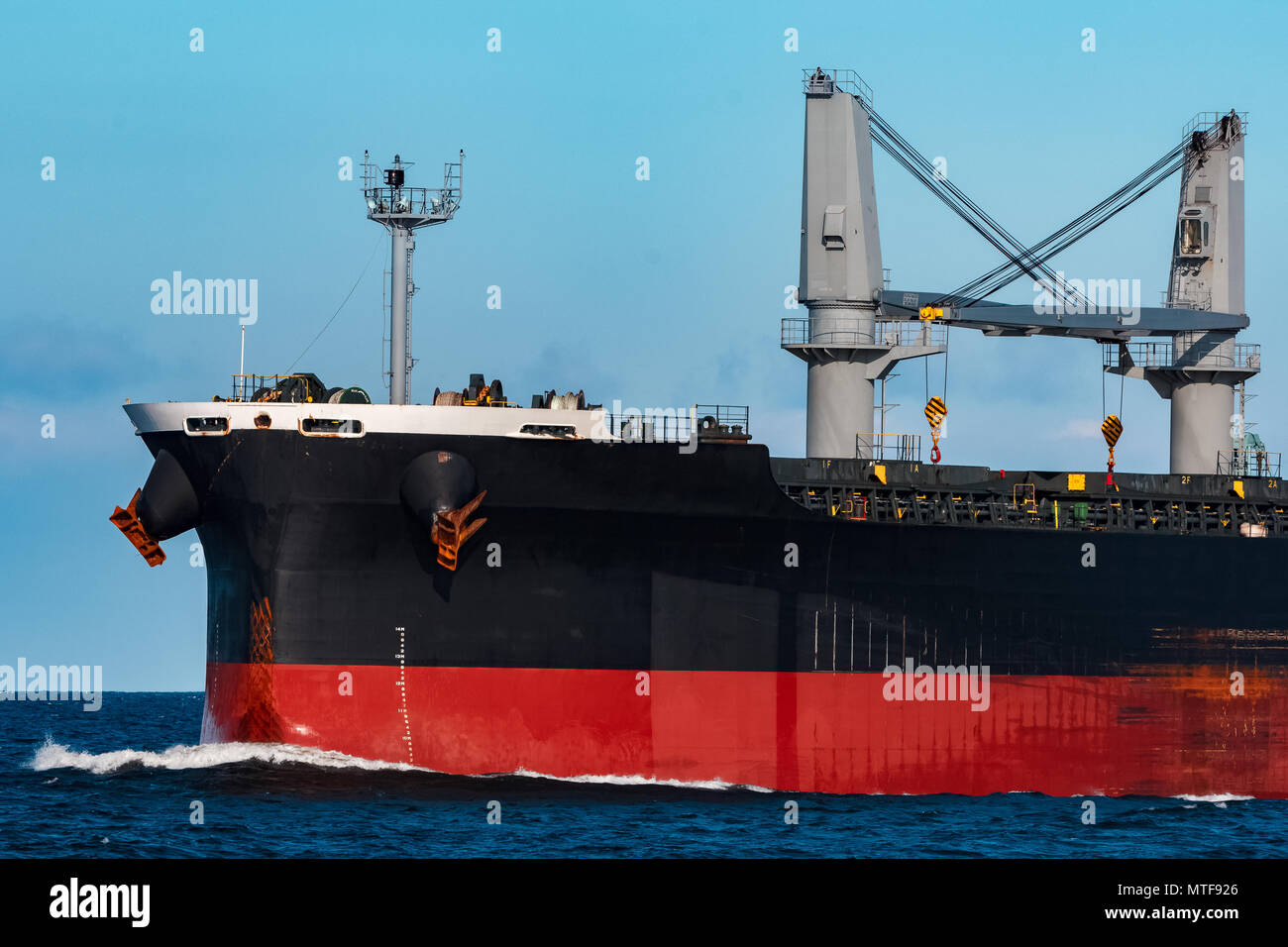 Black bulker ship. Logistics and merchandise transportations Stock ...