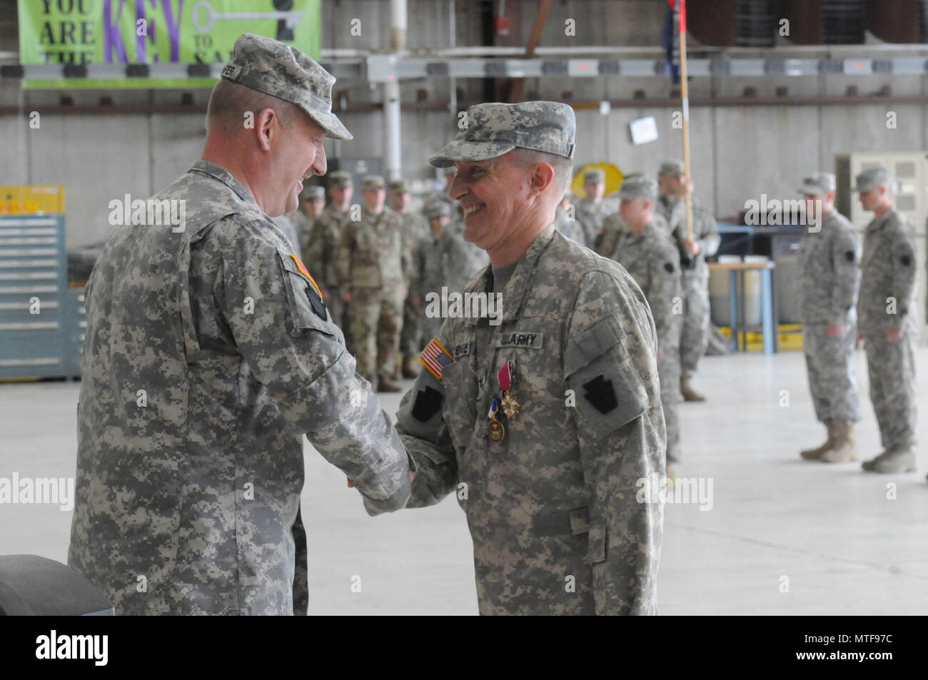 U.S. Army Col. Dennis Sorensen, right, outgoing commander of the 28th ...