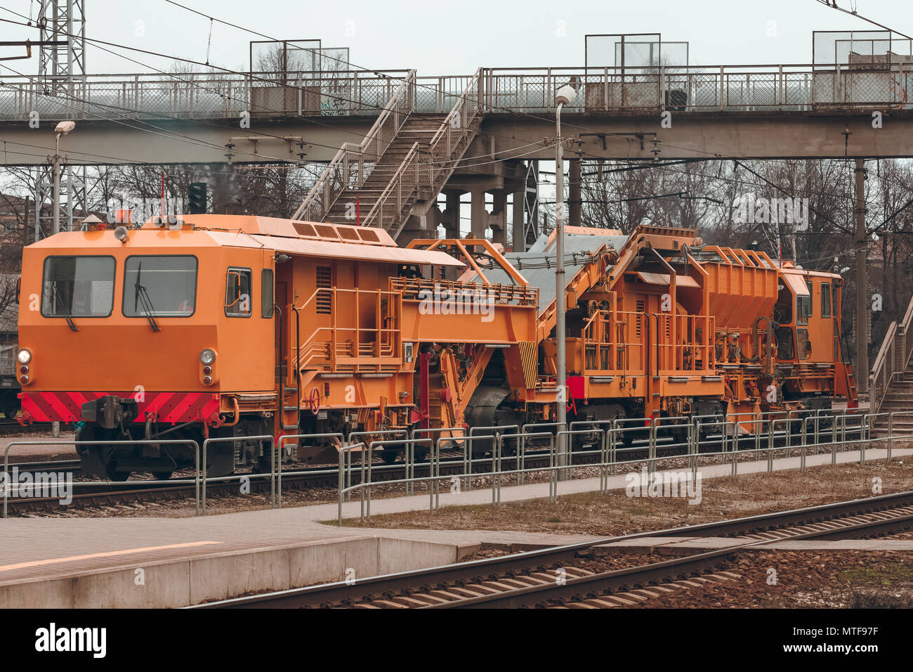 Ballast distributing and profiling track machine. Repair train Stock ...