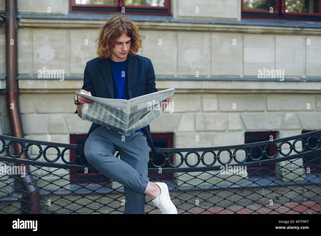 Portrait young reddish, red haired attractive man with curly hair ...