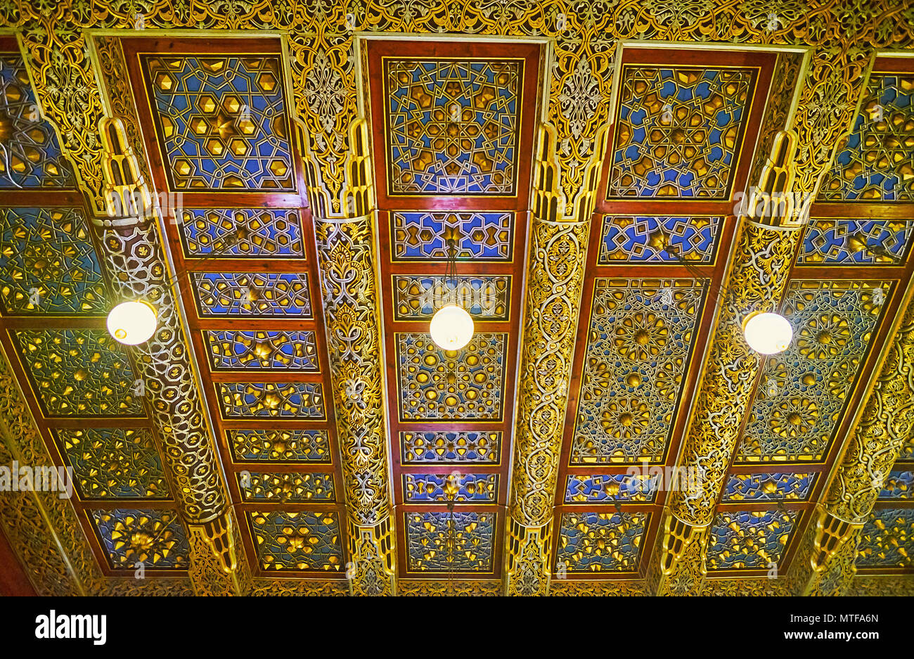 CAIRO, EGYPT - DECEMBER 24, 2017: The complex carved ceiling of living ...