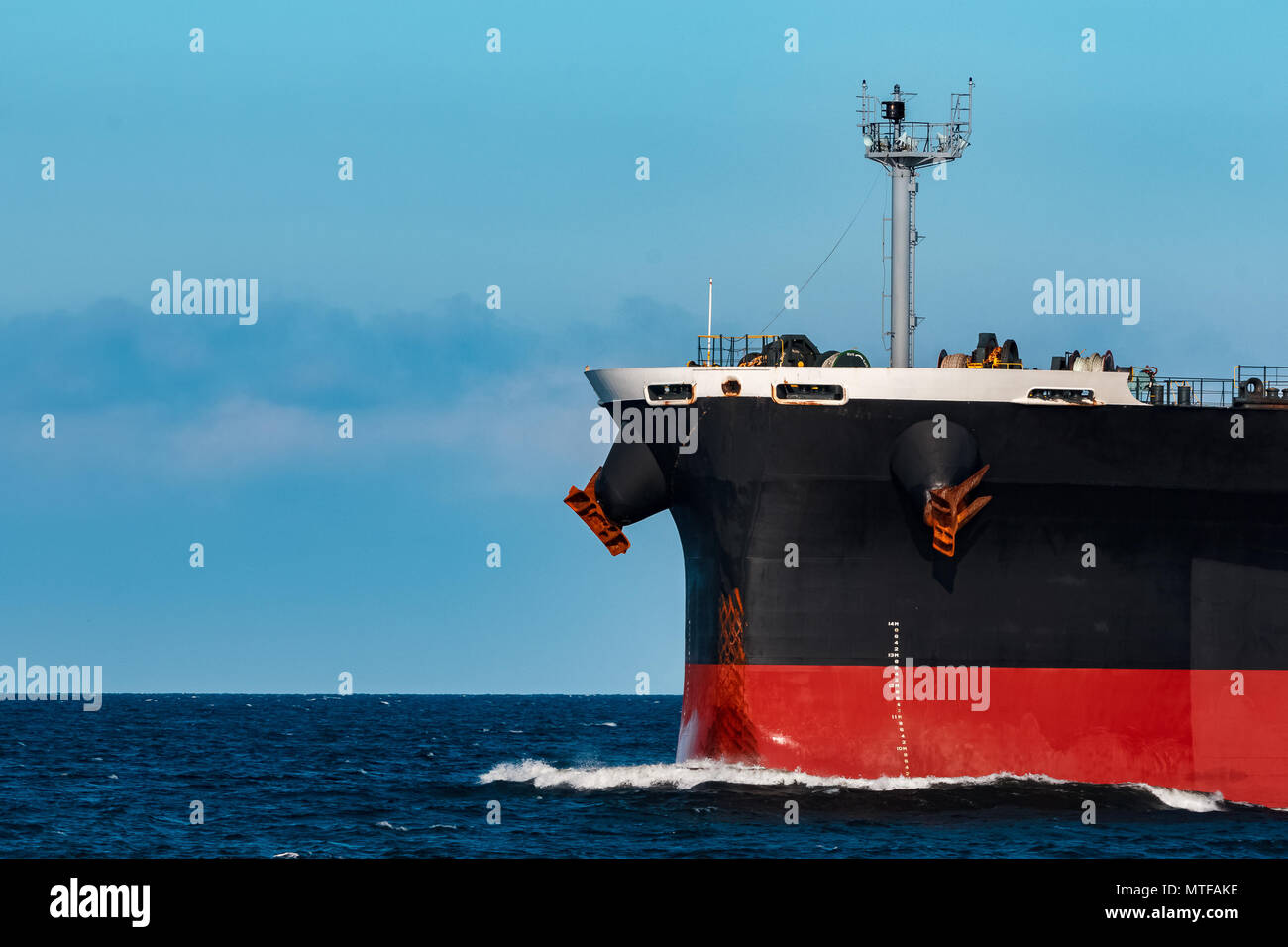 Black bulker ship. Logistics and merchandise transportations Stock ...
