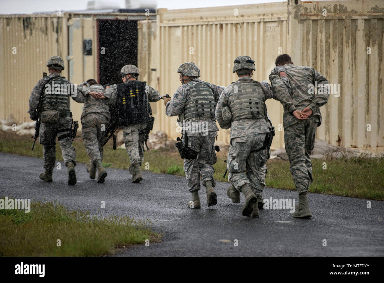 Airmen from the 75th Security Forces Squadron escort Airmen role ...