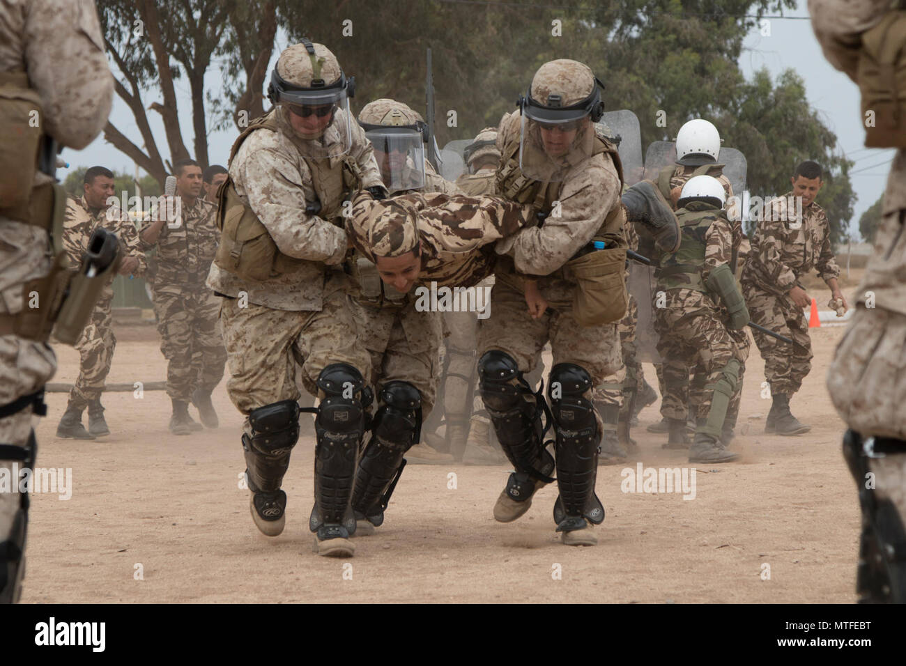 U.S. Soldiers with the 805th Military Police Company, Marines from ...