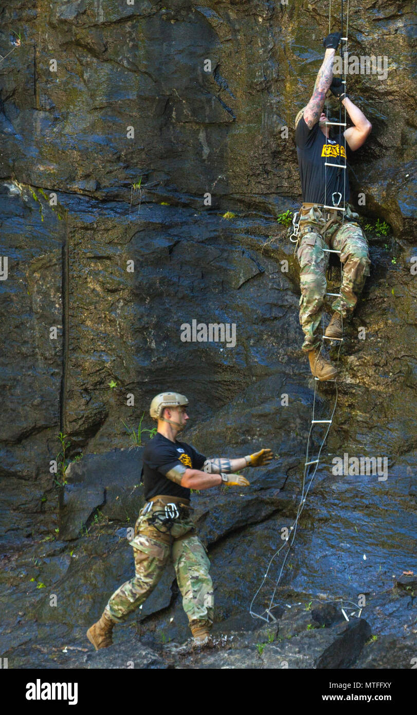 U.S. Army Rangers, of the 5th Ranger Training Battalion (RTB), scale a ...