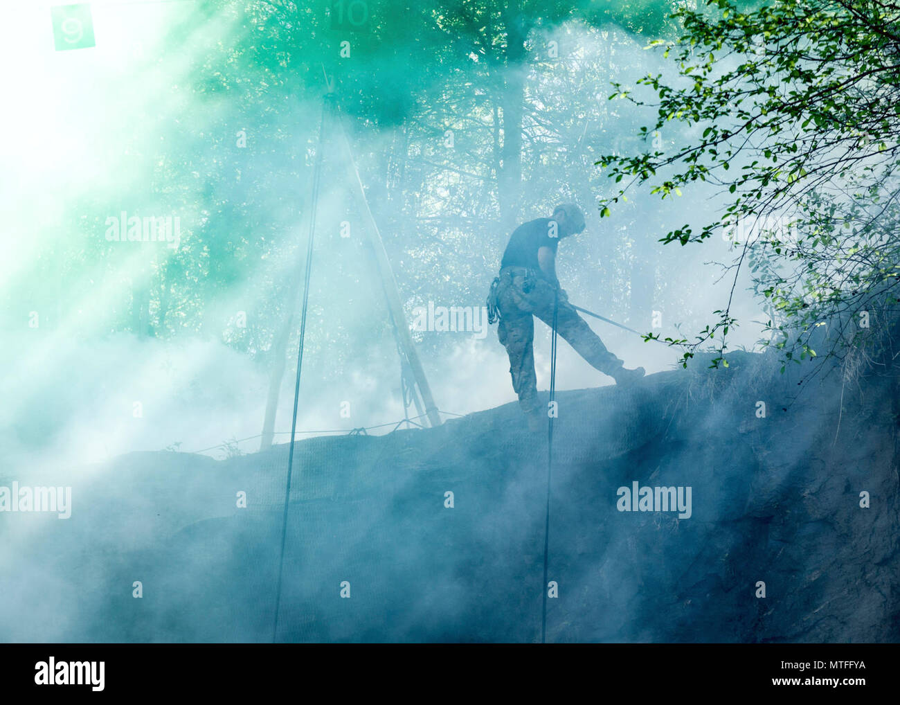 A U.S. Army Ranger, of the 5th Ranger Training Battalion (RTB), rappels ...