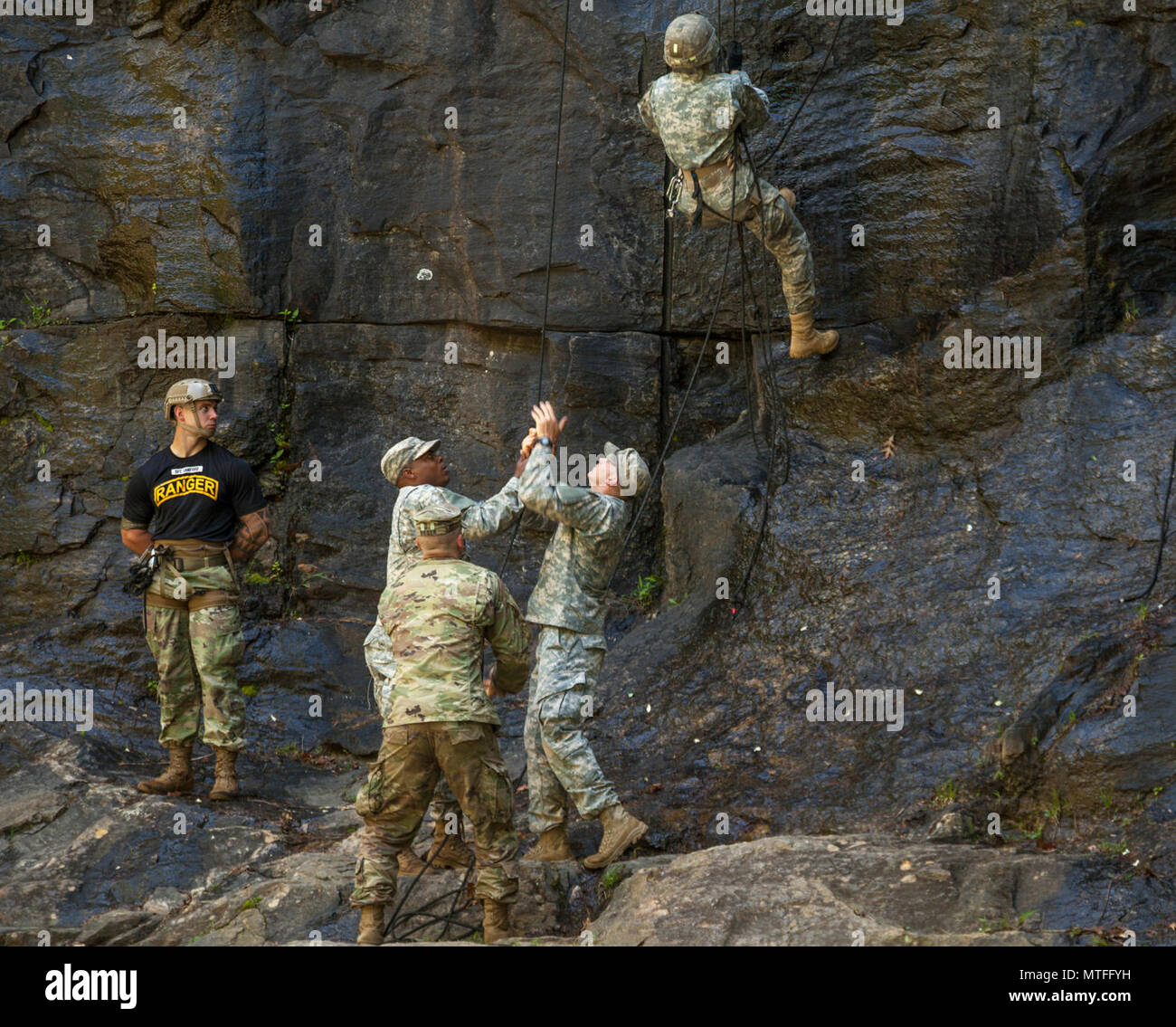 U.S. Army Rangers, of the 5th Ranger Training Battalion (RTB), scale a ...