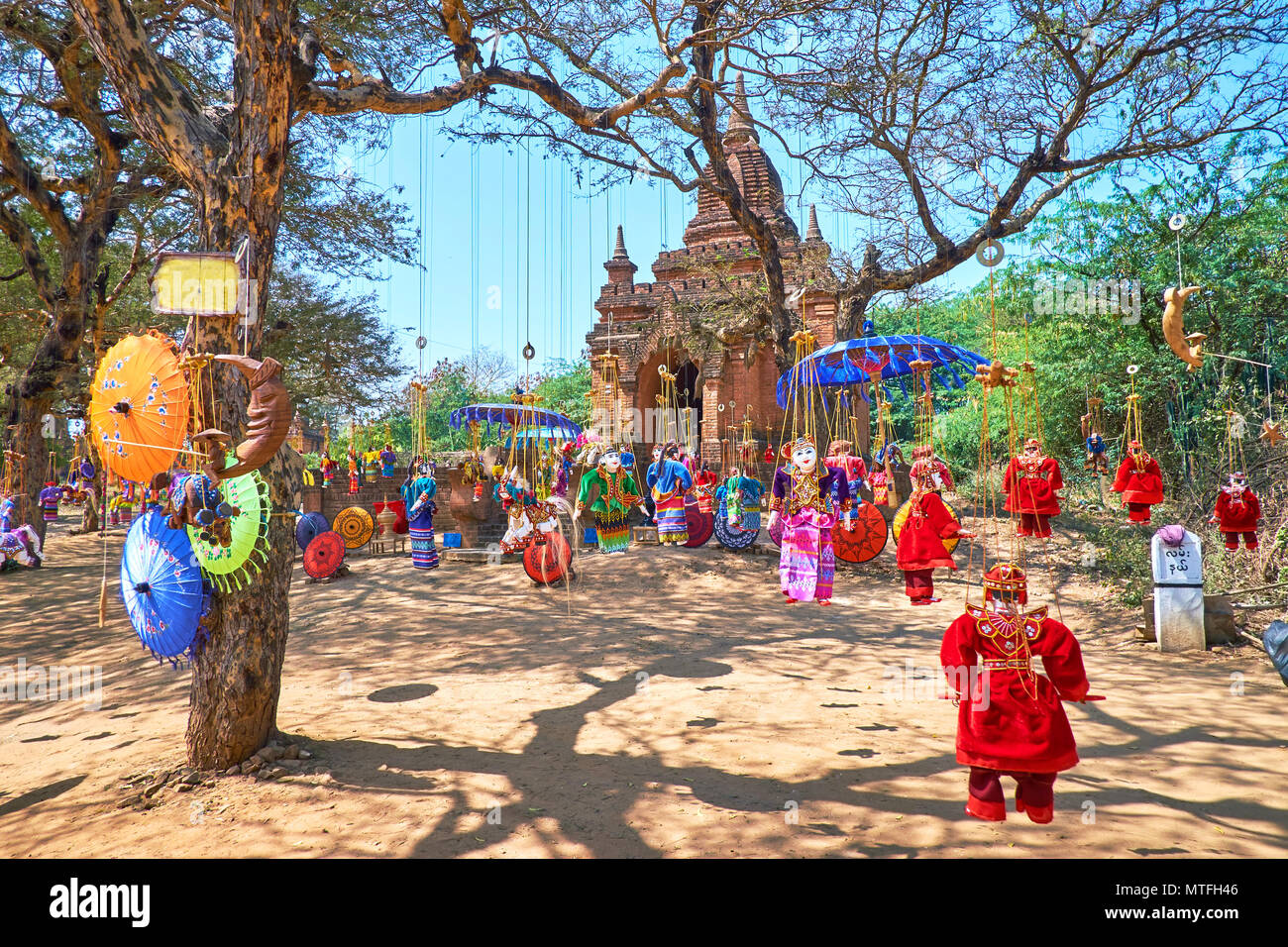 Myanmar traditional marionette dolls in colorful clothes sway on the ...