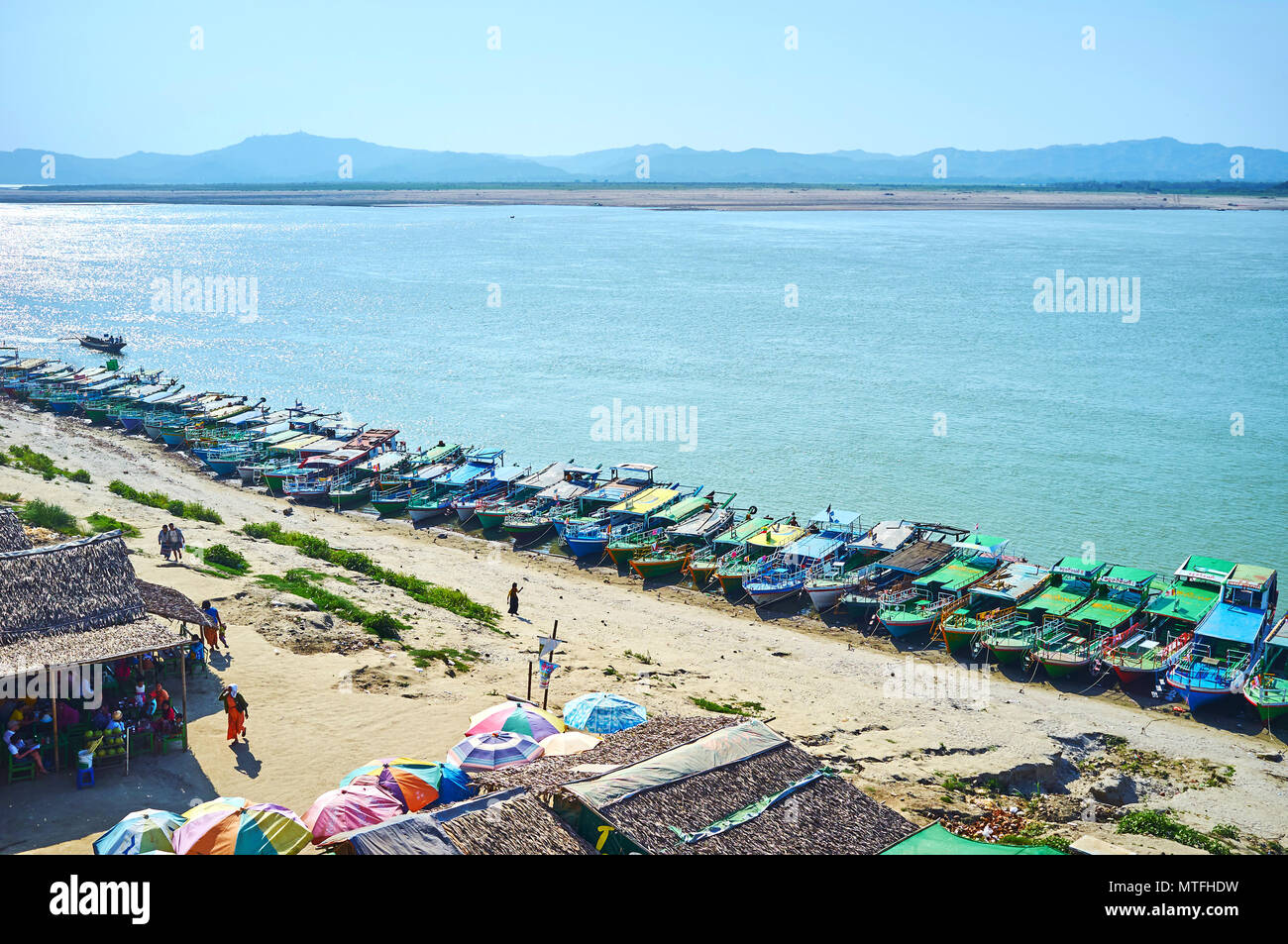 Fishing boats on the irrawaddy river hi-res stock photography and ...