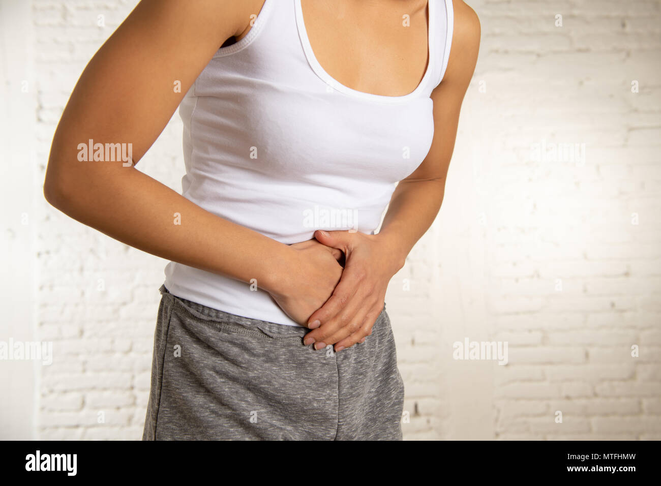 Period pain hi-res stock photography and images - Alamy
