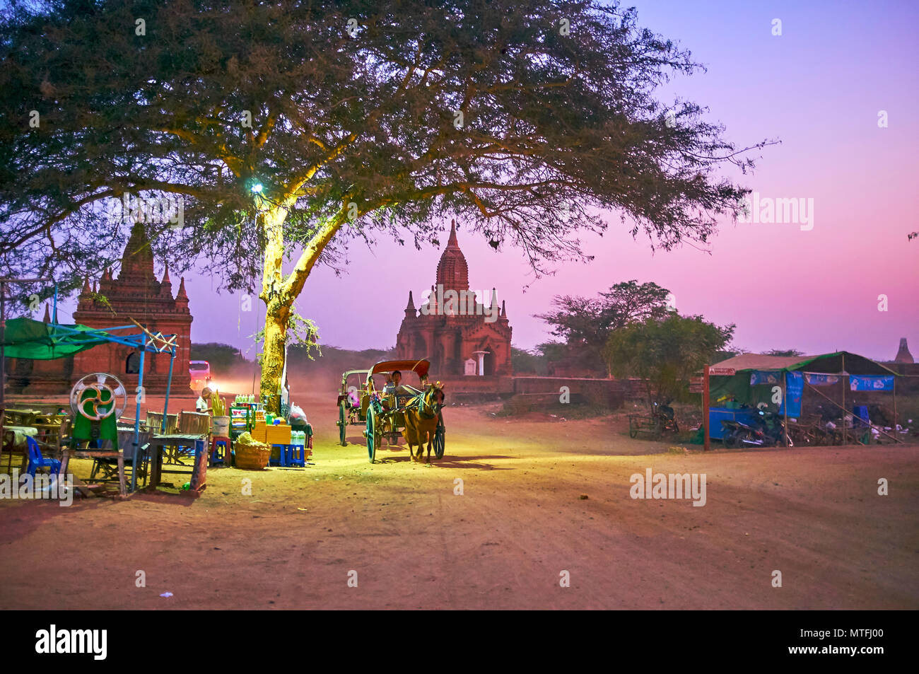 BAGAN, MYANMAR - FEBRUARY 24, 2018: The horse carriages are traditional ...